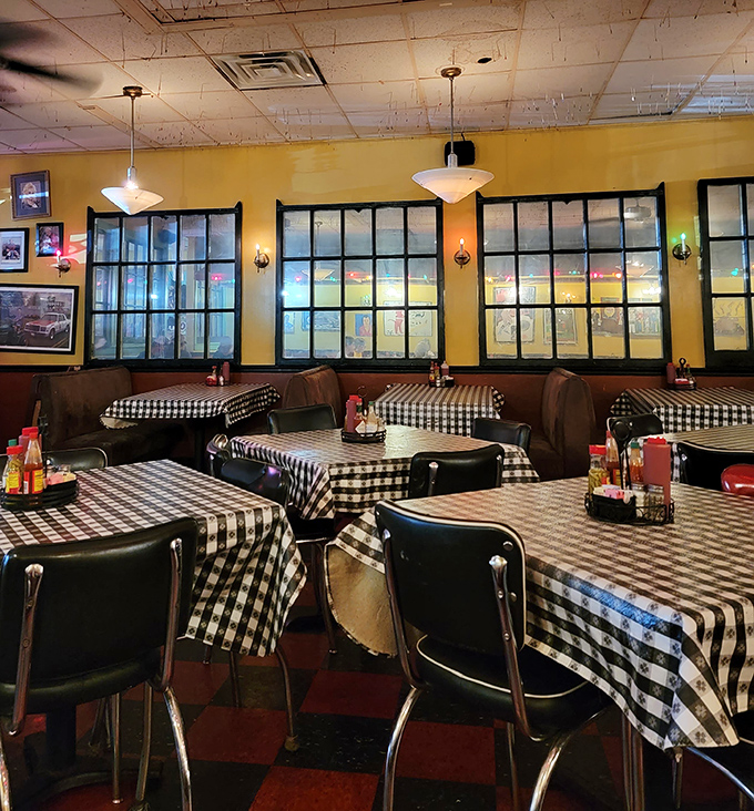 Classic black and white checkered tablecloths set the stage for culinary magic. No pretension here&mdash;just the promise of honest-to-goodness Southern comfort.