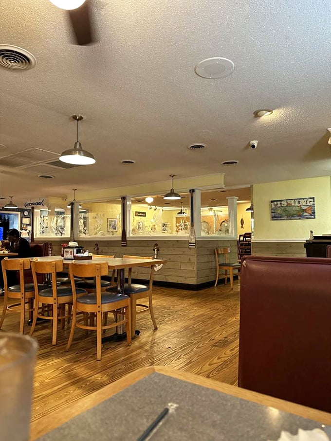 Wooden accents and maritime touches create the perfect backdrop for seafood feasting. This isn't a theme park version of a seafood joint&mdash;it's the real deal.