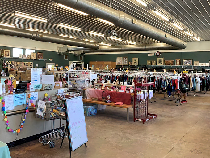 Inside, the treasure hunt begins! Exposed ductwork watches over a carefully organized chaos of potential discoveries waiting for their next chapter.