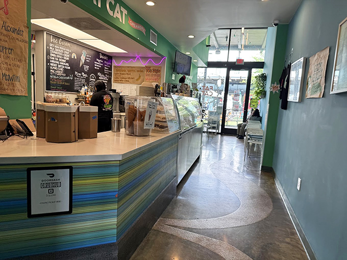 Step inside and the mint green walls instantly cool you down, while that colorful striped counter promises a rainbow of flavors ahead.