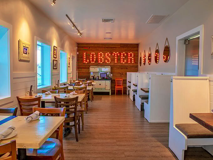That illuminated LOBSTER sign isn't just decor &ndash; it's a beacon of hope for hungry souls seeking maritime delights in a cozy setting.