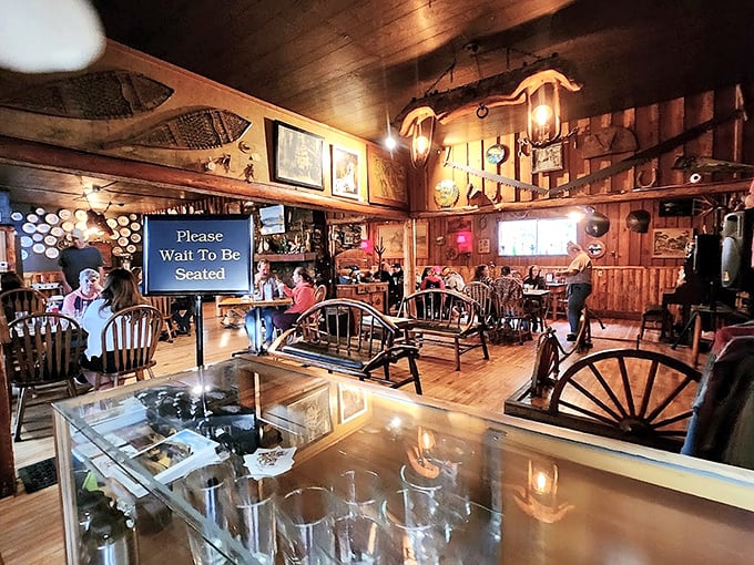 Step inside and you're transported to a bygone era where wooden beams, wagon wheels, and vintage lanterns create the perfect backdrop for culinary adventures.