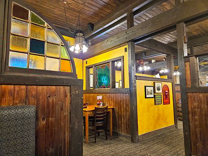 Stained glass dividers and golden walls create intimate dining nooks that would make any Irish grandmother nod with approval.