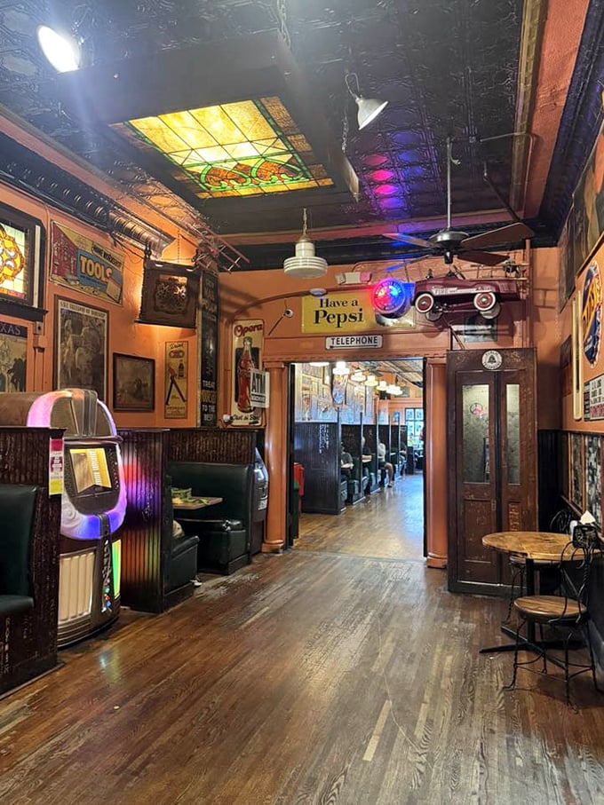 Step inside and the sensory overload begins&mdash;stained glass, vintage signs, and the unmistakable aroma of hot dog heaven awaiting your arrival.