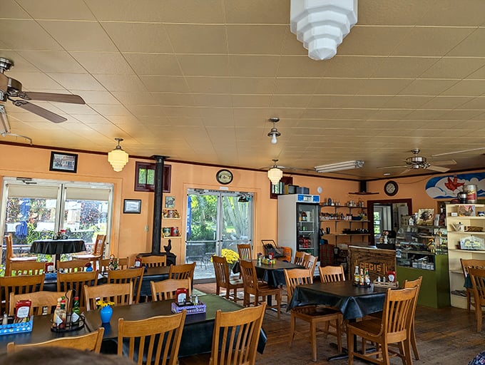 Wooden chairs, warm lighting, and windows that frame Montana's beauty – dining at Café Regis feels like breakfast at your coolest friend's house.