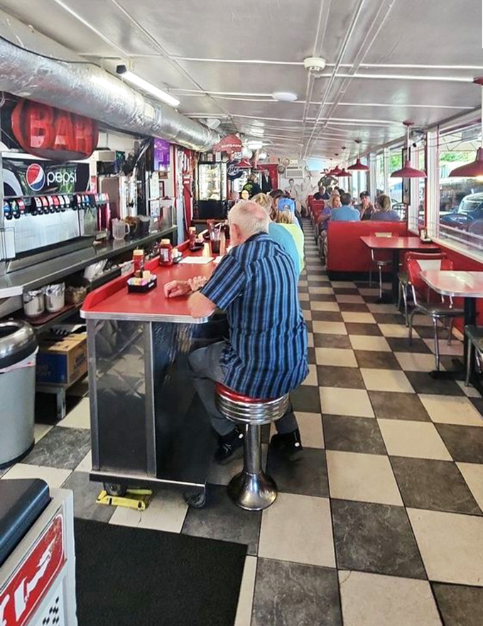 Classic Americana lives on inside Ed Walker's, where the checkered floor and counter seating transport you to a simpler time of honest food and conversation.