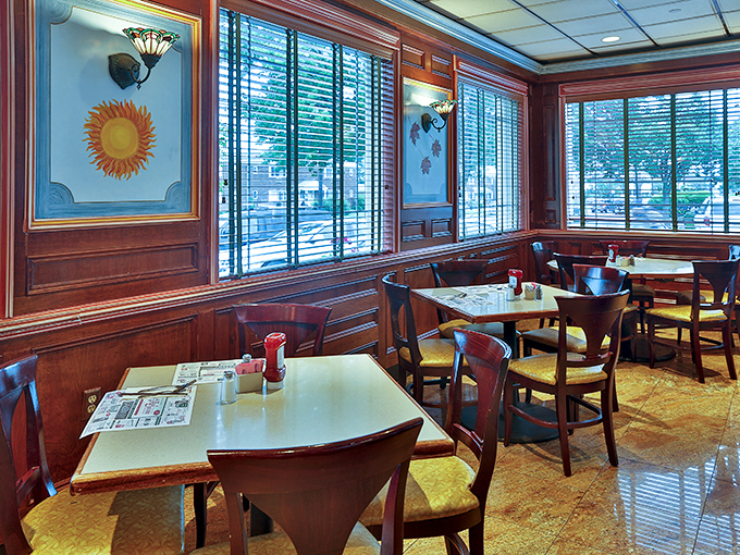 Warm wood paneling and sun motifs create that perfect diner ambiance&mdash;where conversations flow as freely as the coffee refills.