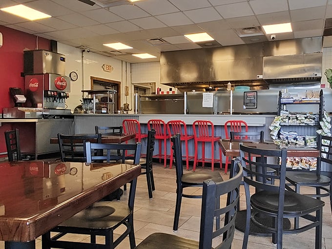 No-frills perfection with those signature red counter chairs &ndash; where sandwich magic happens in full view of lucky diners.