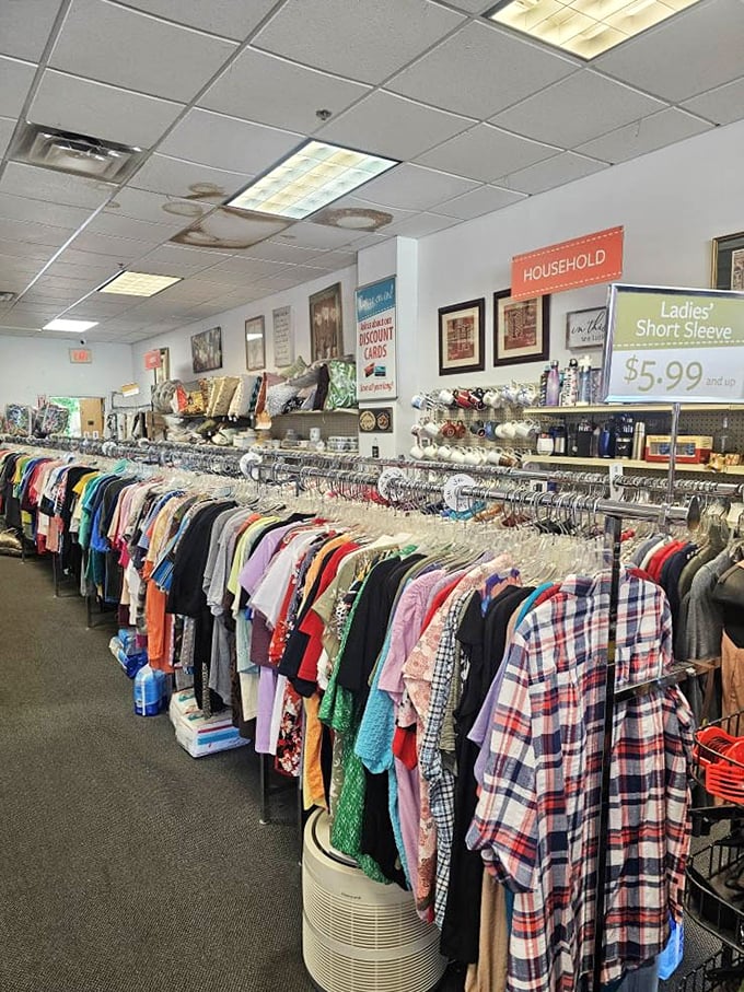 Racks upon colorful racks of possibility! The ladies' section is organized chaos at its finest, where designer gems hide among everyday finds.