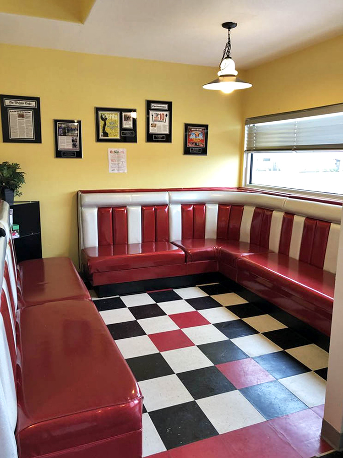 Those cherry-red vinyl booths and checkered floors prove that some design choices are classics for a reason, not trends.