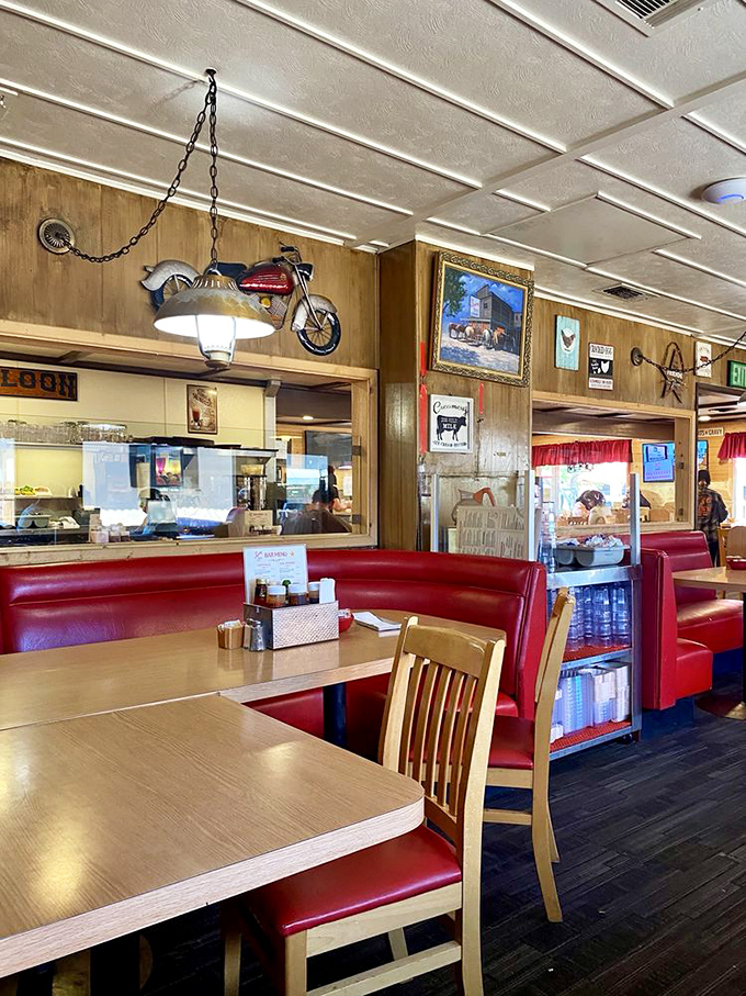 Classic red vinyl booths and wood-paneled walls create the perfect backdrop for the culinary time travel that awaits inside.