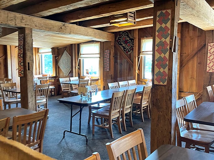 Exposed wooden beams and handcrafted quilts create an atmosphere that whispers "slow down and stay awhile"&mdash;authentic Amish country dining at its most inviting.