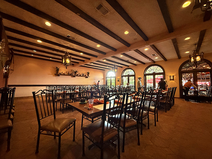 The dining room's warm wooden beams and terra cotta floors set the stage for what many consider a religious experience in enchilada form.