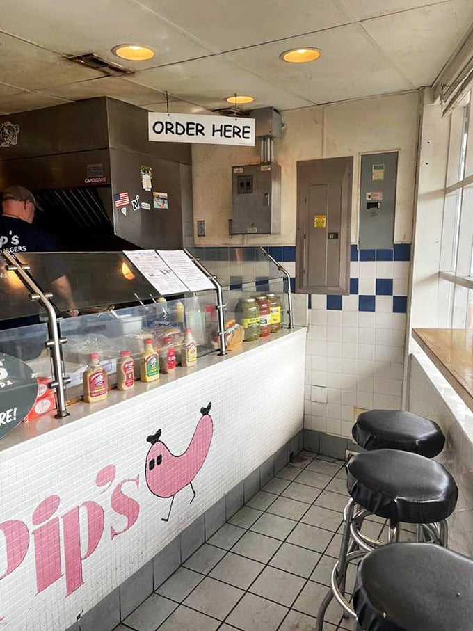Simple counter service with a handwritten "ORDER HERE" sign&mdash;because sometimes the best food experiences don't need digital menus or QR codes.
