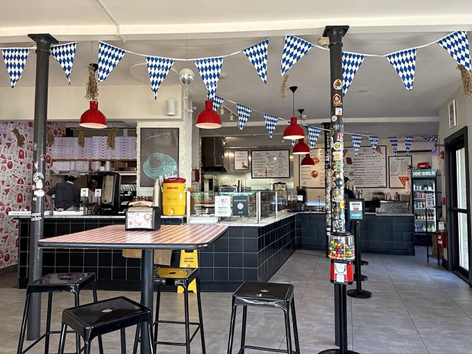 Step inside and the party begins! Blue pennants and red pendant lights create a perpetual celebration vibe that says, "You've arrived at pizza paradise."