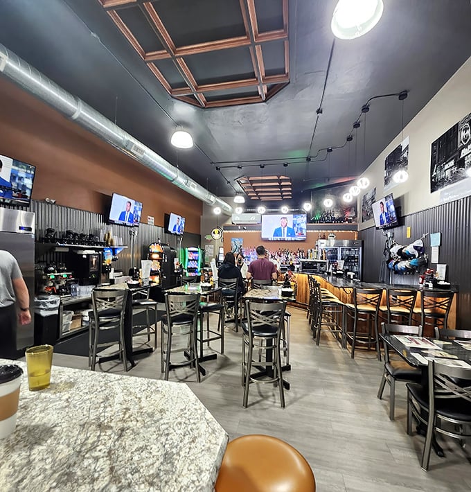 Inside, corrugated metal meets wood details in a space where TVs broadcast the game and conversations flow as freely as the coffee.