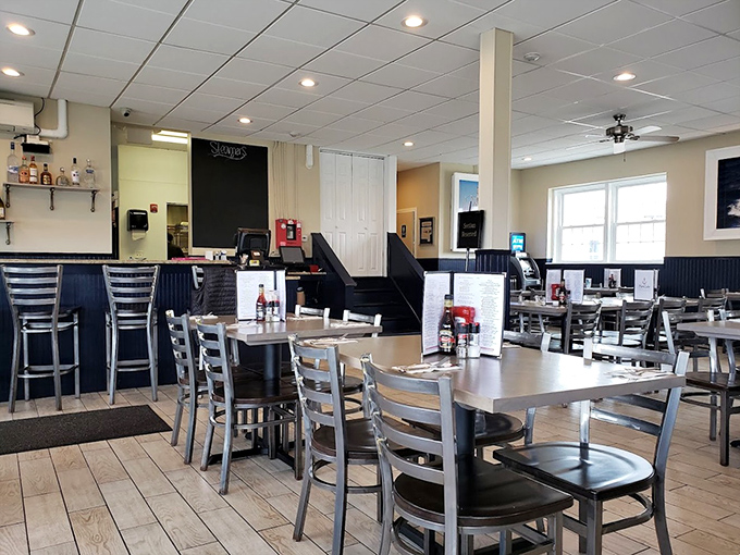 Simple, nautical-inspired interior with metal chairs and clean lines&mdash;because when the seafood's this good, who needs fancy d&eacute;cor?