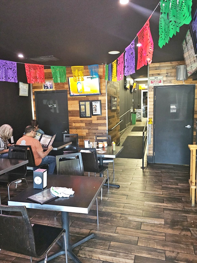 The warm wooden interior feels like being welcomed into someone's home, complete with festive decorations that signal you're in for something special.