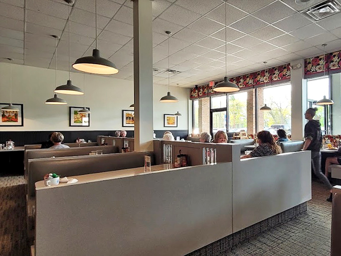 Cozy booths and pendant lighting create the perfect backdrop for morning conversations and coffee refills that never end.