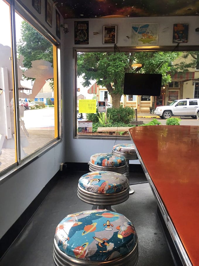 The cosmic-themed bar stools invite diners to park their terrestrial bodies while their taste buds prepare for interstellar travel.