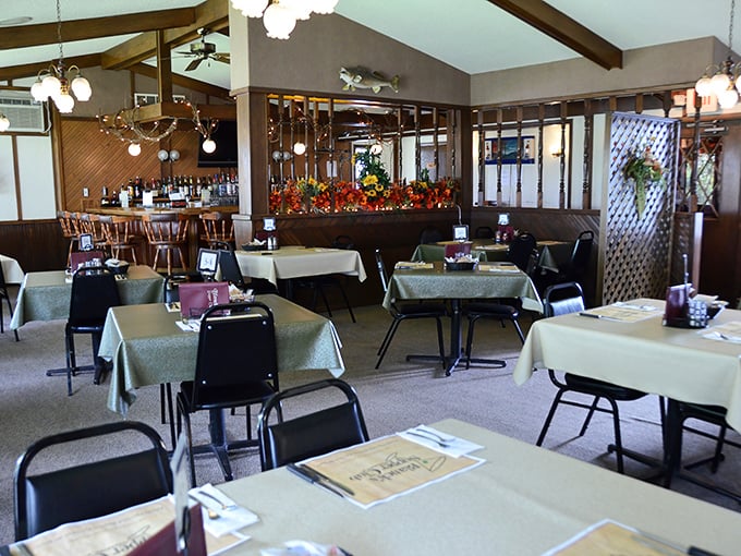 Classic supper club ambiance in full effect&mdash;wood paneling, comfortable seating, and lighting dim enough for romance but bright enough to admire your lobster tail.