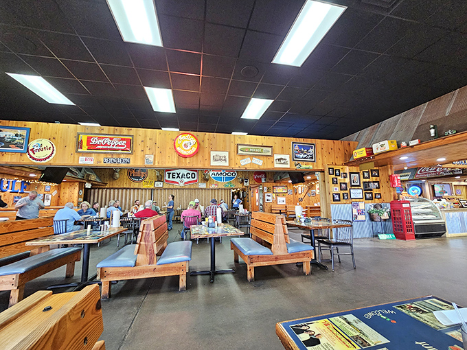 Step inside and you're transported to a nostalgic wonderland where vintage signs and wood paneling create the perfect backdrop for comfort food magic.