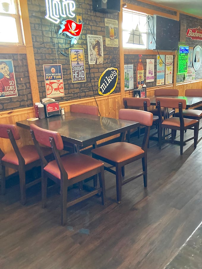 Step inside and the colorful wall décor tells you everything – this is where locals gather for good food, cold drinks, and zero pretension.