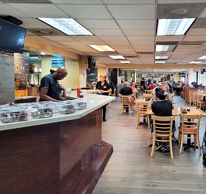 The bustling interior hums with conversation and clattering plates &ndash; a symphony of satisfaction that's been playing daily for decades. 