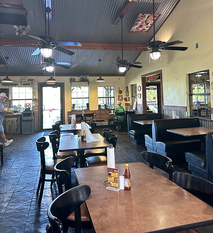Inside, corrugated metal ceilings and warm lighting create that perfect "fancy enough for Sunday dinner, casual enough for Tuesday lunch" atmosphere.