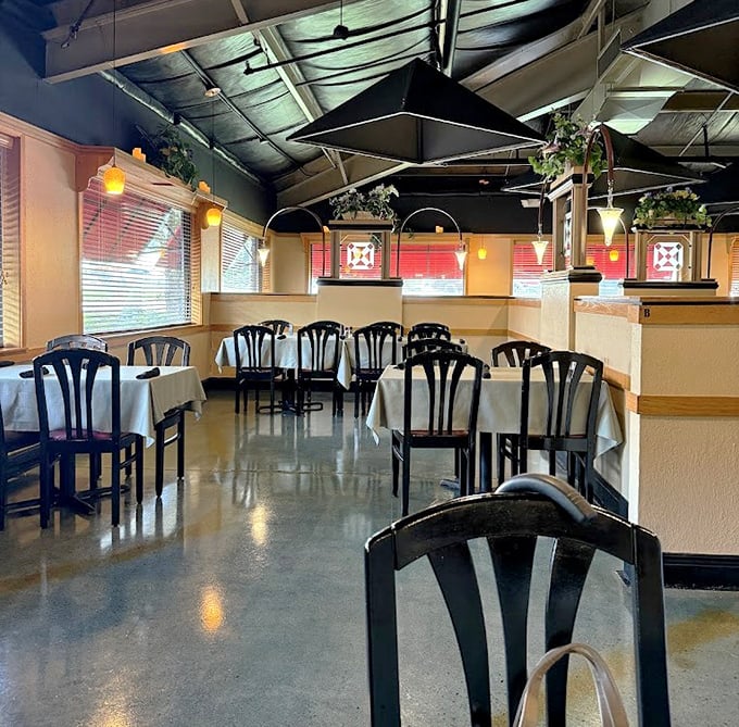Simple elegance defines the dining room, where black chairs and white tablecloths create the perfect backdrop for the star attractions: perfectly cooked steaks and trout.