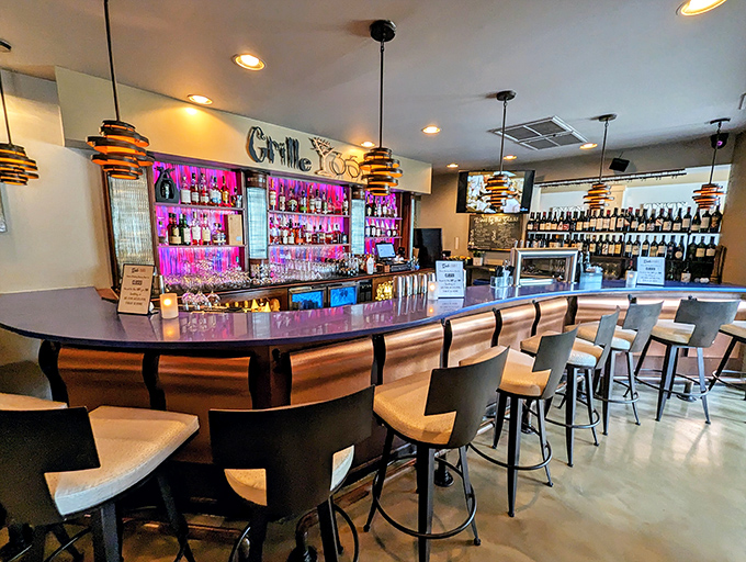 The bar at Grille 3501 isn't just a place to wait for your table&mdash;it's a destination itself, with lighting that makes everyone look like a movie star.