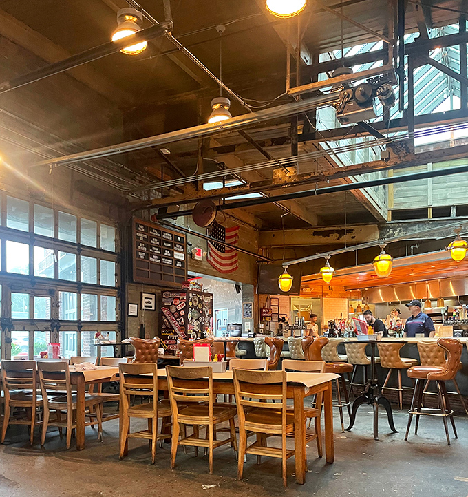 Industrial chic meets automotive nostalgia under a canoe&mdash;because why not add watercraft to your dining experience?