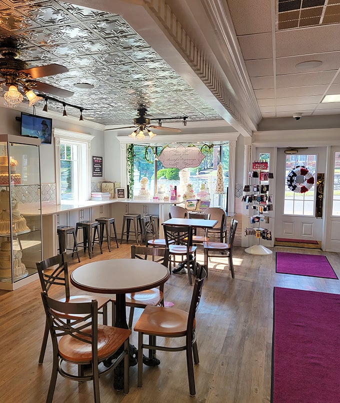 The caf&eacute; area's ornate tin ceiling and warm wooden floors create the perfect setting for that "just one more bite" conversation with yourself.