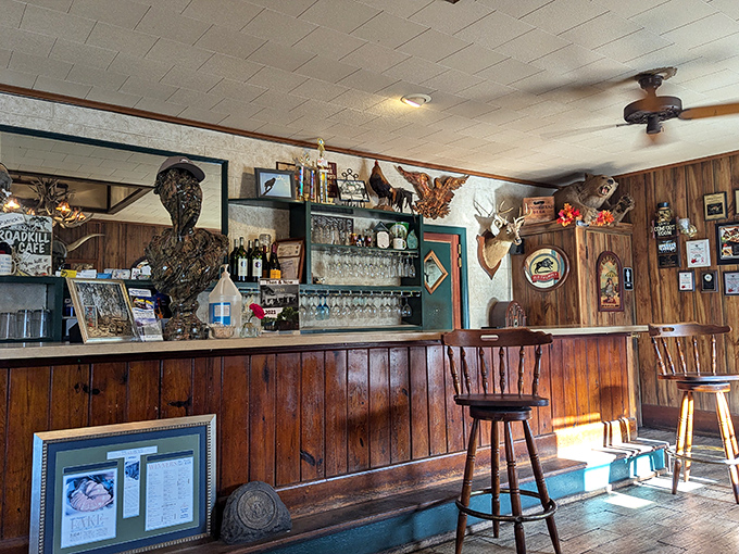 Wood paneling, mounted trophies, and vintage memorabilia create the perfect atmosphere for serious eating. This bar has witnessed more food epiphanies than a cooking show marathon.