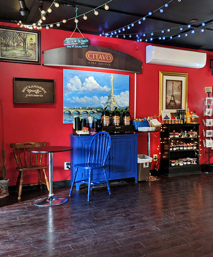 The vibrant red walls and twinkling lights create the perfect backdrop for plotting your next pastry conquest.