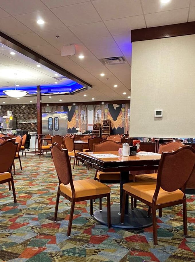 The warm wood tones and colorful carpet create that perfect diner atmosphere where comfort food and comfort seating join forces.