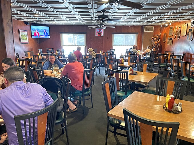 Inside, wood paneling and lattice ceilings create that perfect "everybody knows your name" vibe where comfort food and conversation flow equally freely.
