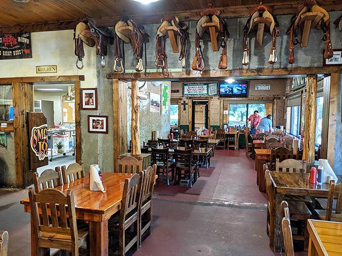 Those saddles overhead have seen more dining room action than most rodeo arenas, and they're loving retirement.
