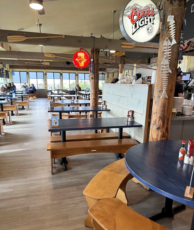 Inside, wooden beams and bench seating create that perfect "come as you are" atmosphere where memories are made between spoonfuls of legendary chowder.