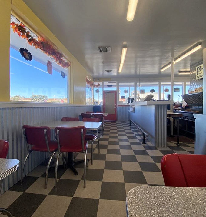 Classic black and white checkered floors, metal wainscoting, and red vinyl chairs &ndash; this isn't retro design, it's just never changed. And thank goodness for that.