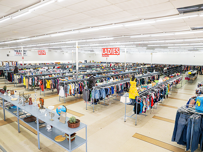 Behold the promised land of pre-loved fashion! Row after meticulous row of clothing stretches toward the horizon like a textile Grand Canyon.