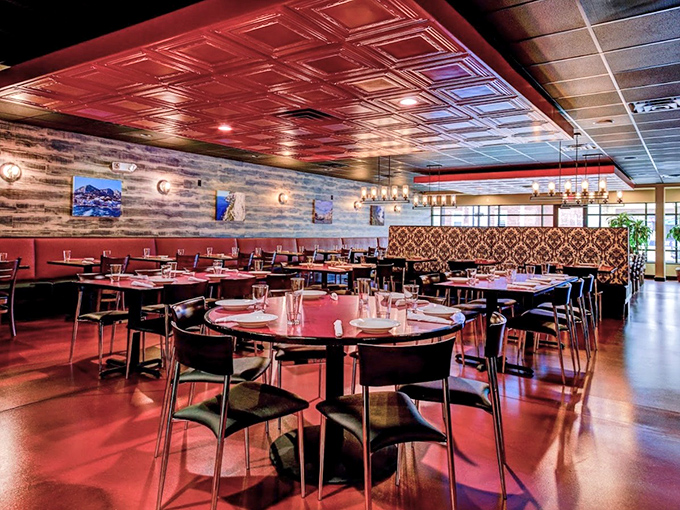 Step into a world where pizza is religion. The red ceiling tiles and warm lighting create the perfect atmosphere for culinary worship.