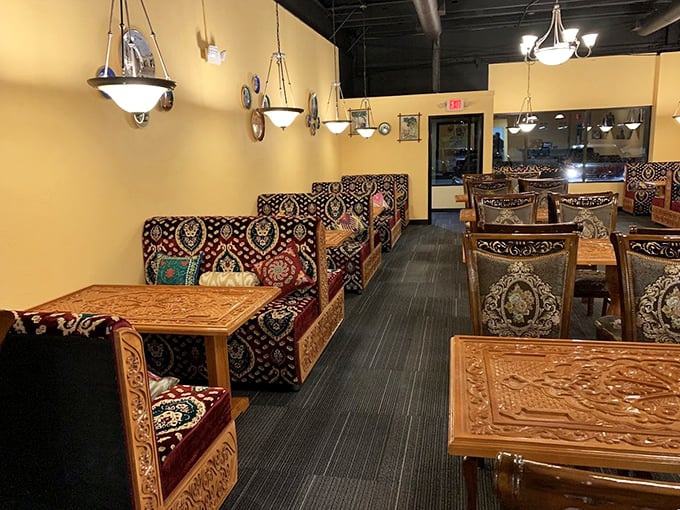 Step inside and suddenly you're transported to Central Asia, where ornate wooden tables and plush seating invite you to settle in for a proper feast.