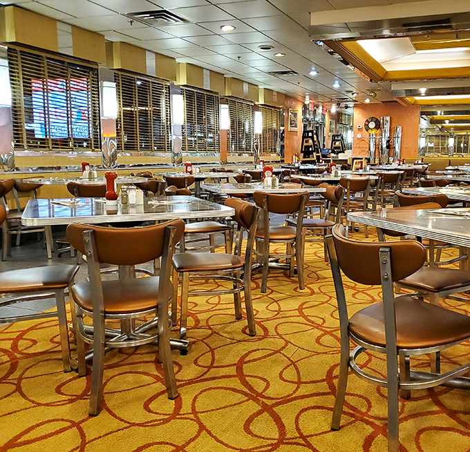 The warm amber tones and circular patterns of Tick Tock's interior create the perfect backdrop for late-night philosophical discussions or early morning recovery missions.