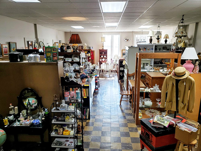 Narrow aisles and checkerboard floors lead you through a labyrinth of memories, each vendor space a new adventure waiting to unfold.