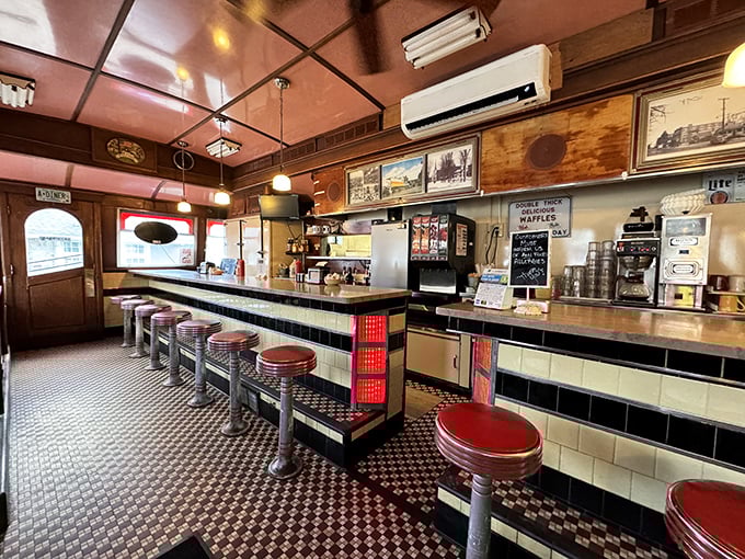 Counter seating with those iconic red vinyl stools&mdash;where the breakfast magic happens and regulars claim their unofficial assigned seats.