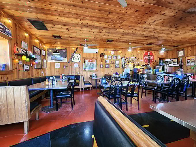 Warm wooden paneling and Route 66 memorabilia create the perfect time capsule interior. It's like dining inside a nostalgic hug.