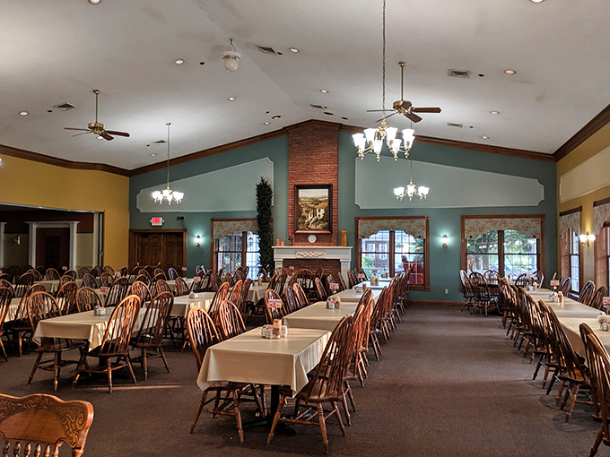 Wooden Windsor chairs and crisp white tablecloths await hungry travelers in a dining room that manages to feel both spacious and cozy at the same time.