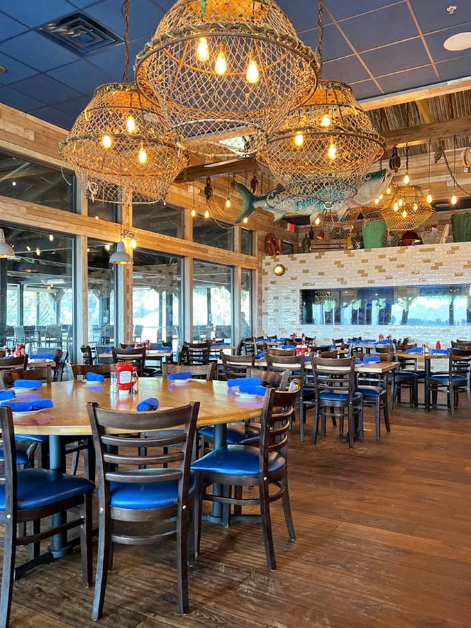Those crab trap chandeliers aren't just clever decor—they're a luminous preview of the ocean's bounty below.