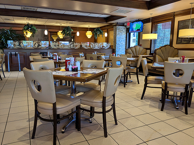 Inside, comfortable booths and warm lighting create that perfect diner ambiance where conversations flow as freely as the coffee refills.